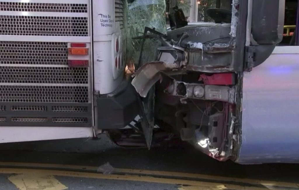 NYC tour bus driver who slammed into city bus gets ticket for running red light - Herald-Standard
